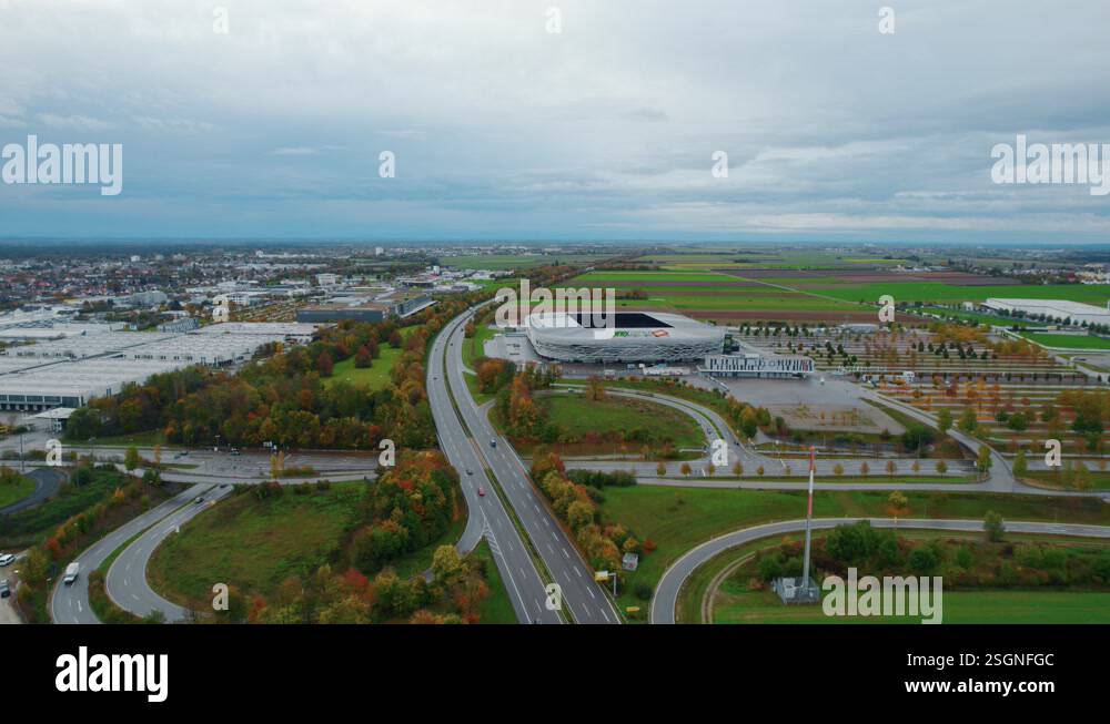 Drone shot moving backwards of WWK arena, the official football stadium ...