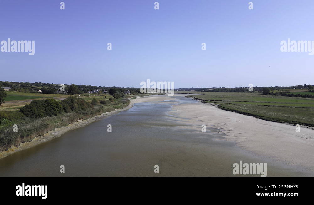 Flying across river with very low water levels. Normandy, France Stock ...