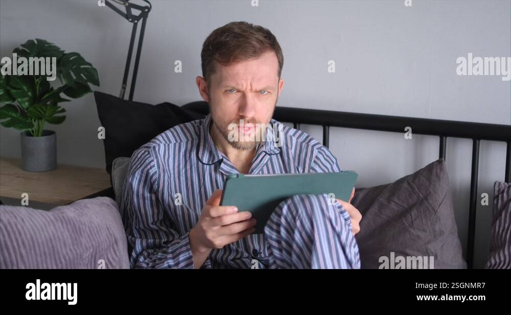 Confused man in pajama Stock Videos & Footage - HD and 4K Video Clips ...