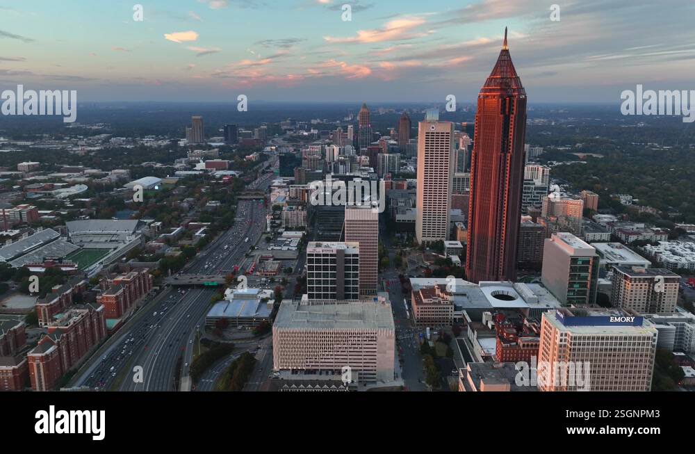 High aerial view of Atlanta Georgia skyscraper towers at night. Emory ...