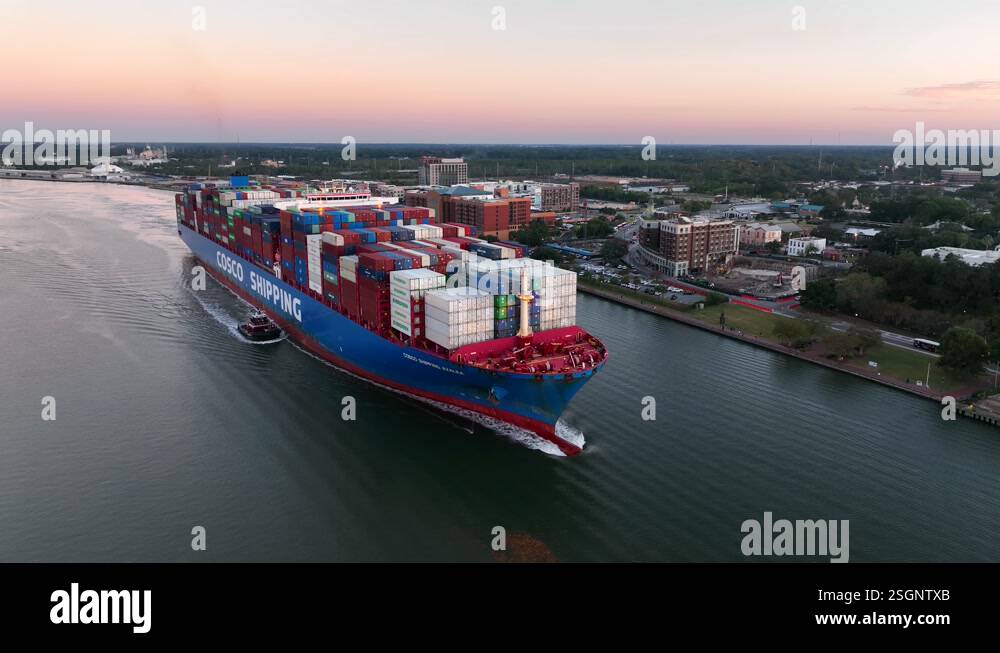 Tugboat guides Cosco Shipping cargo ship up Savannah River past ...