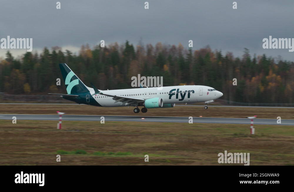 airplane flyr boeing 737 max 8 arrival landing side view oslo airport ...