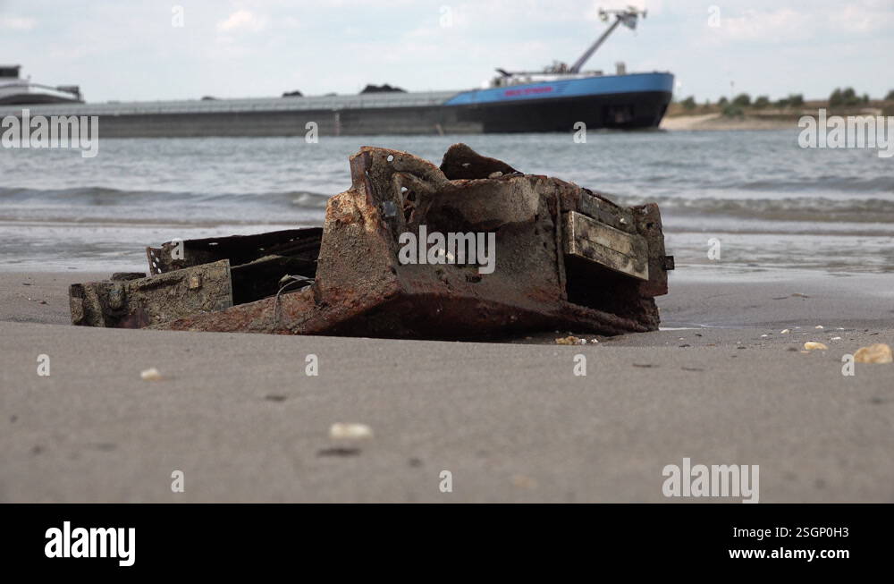 Low water levels Europe, dumped computer exposed on riverbed, cargo ...