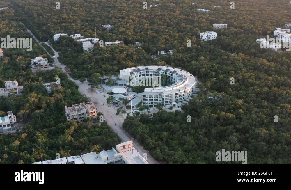Counter clockwise orbiting shot of white building in Tulum Mexico ...