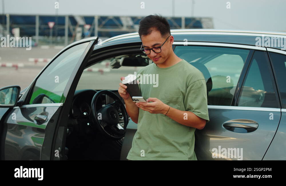 Young asian man driver close-up. Car sharing concept, vehicle and ...
