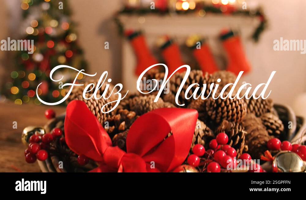 Animation of feliz navidad text over christmas decorations Stock Video ...