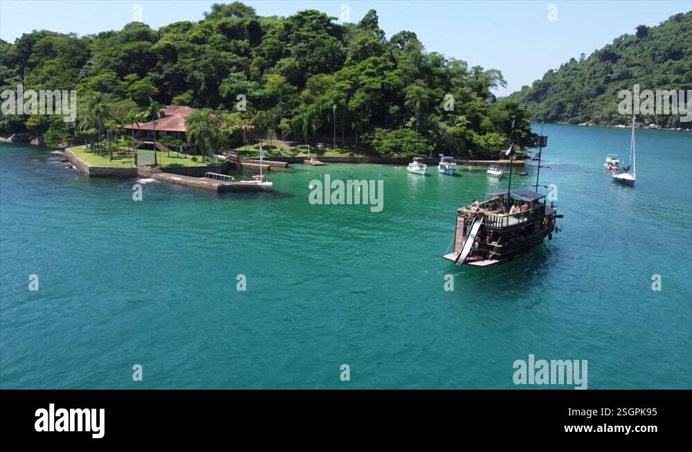 Pirate Ship Tour Pulling up to Tropical Island in Brazil's Atlantic ...