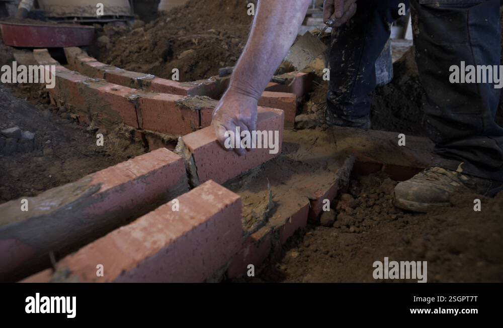 Unrecognizable Foundry Worker Building Brick Canal to Guide Molten ...