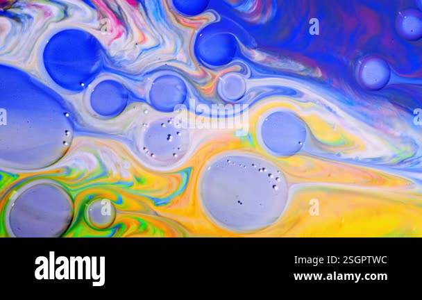 This vibrant abstract design features colorful oil droplets in water ...