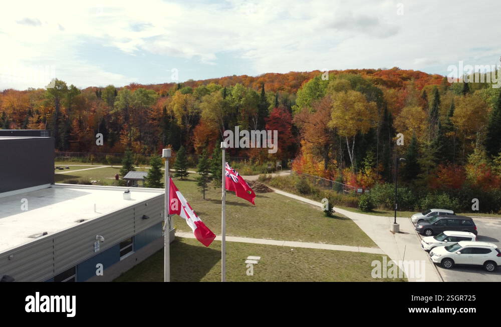 Flag Of Canada And Canadian Red Ensign Waving Outside Government ...