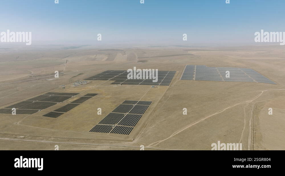 Large Solar station in arid field and plain steppe lanscape, power ...