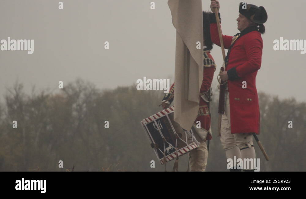 Rev War British Soldiers stand with white flag of surrender, Yorktown ...