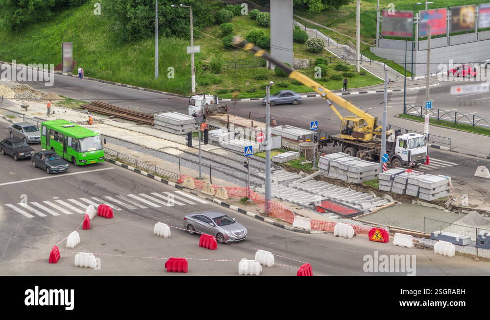 Loader crane for loading and unloading concrete plates from truck which ...