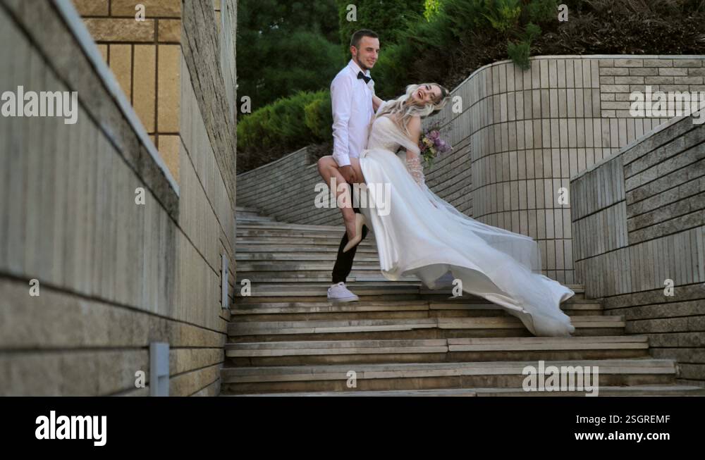 A couple in love, the bride and groom kiss in a beautiful pose. the ...