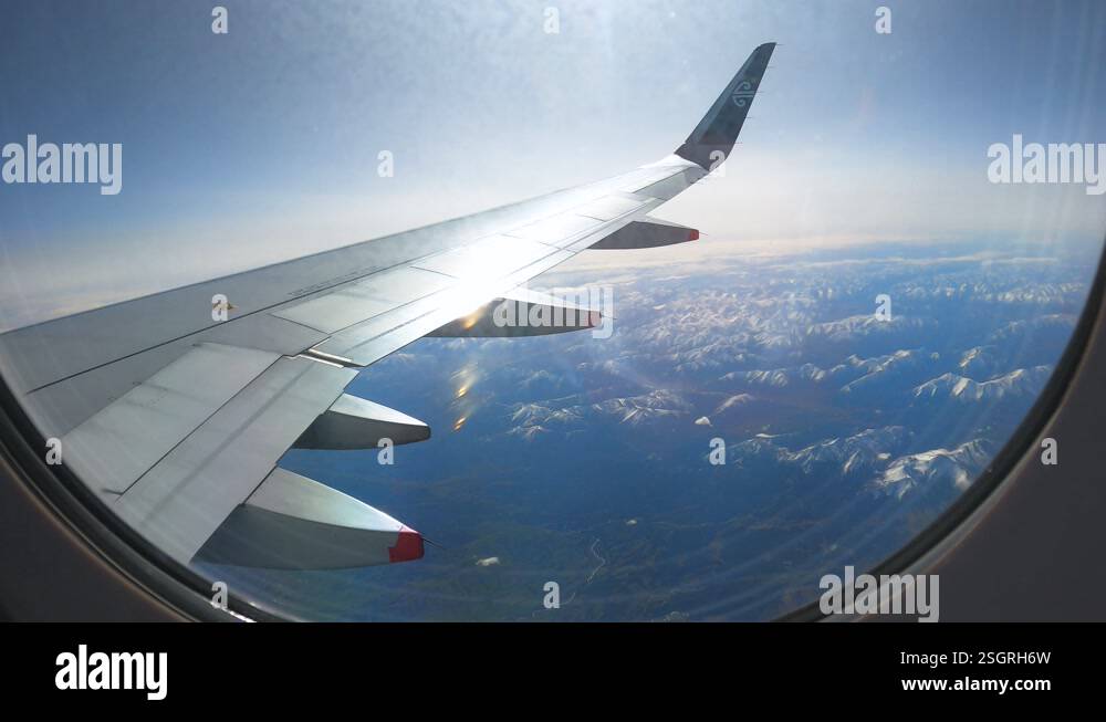 Jet Plane Wing And Wing Flaps Seen Through Glass Window On A Sunny ...