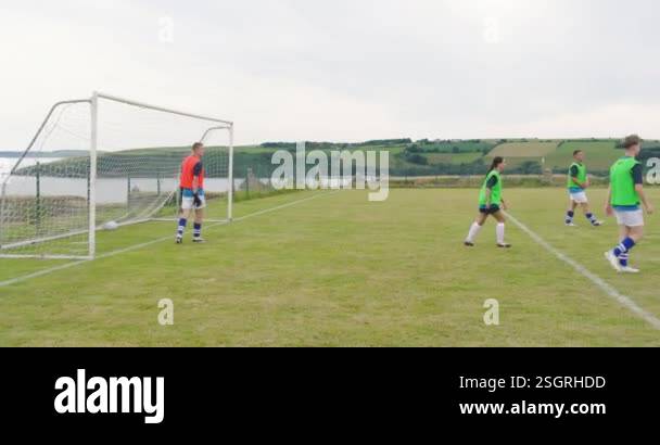 Female athlete is running with a soccer ball Stock Videos & Footage ...