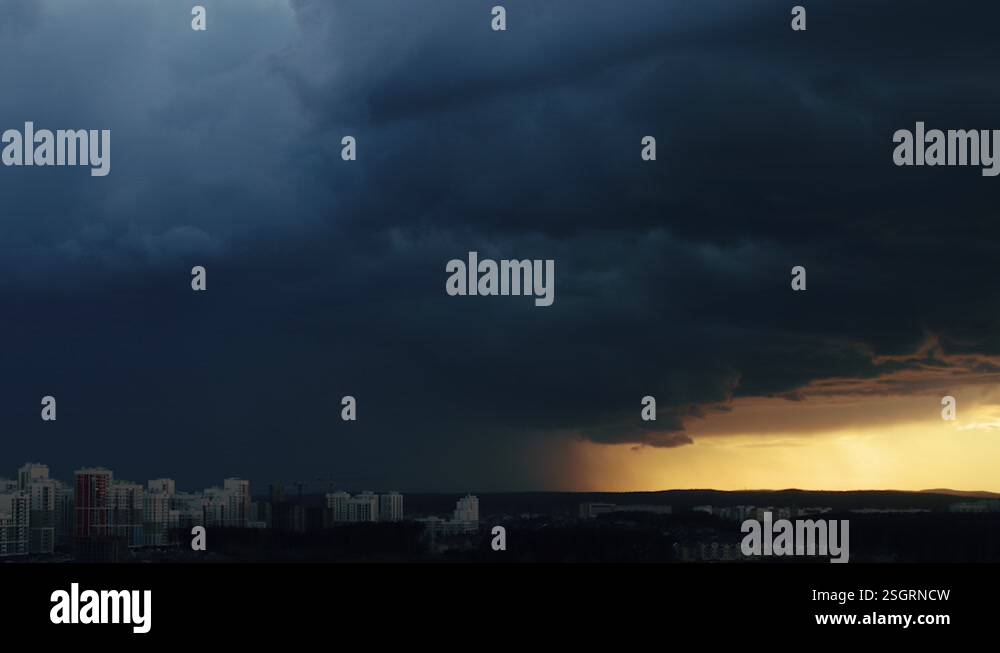 A shot of thunderclouds over a city Stock Video Footage - Alamy
