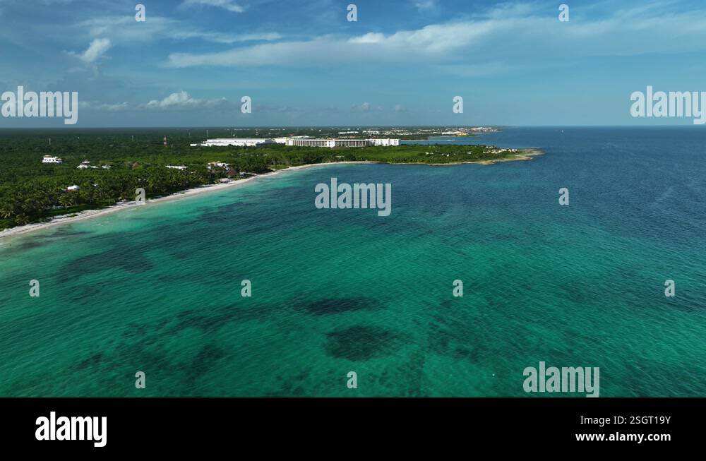 Aerial overview of the sunny shoreline of Xpu-Ha, Mexico - rising ...