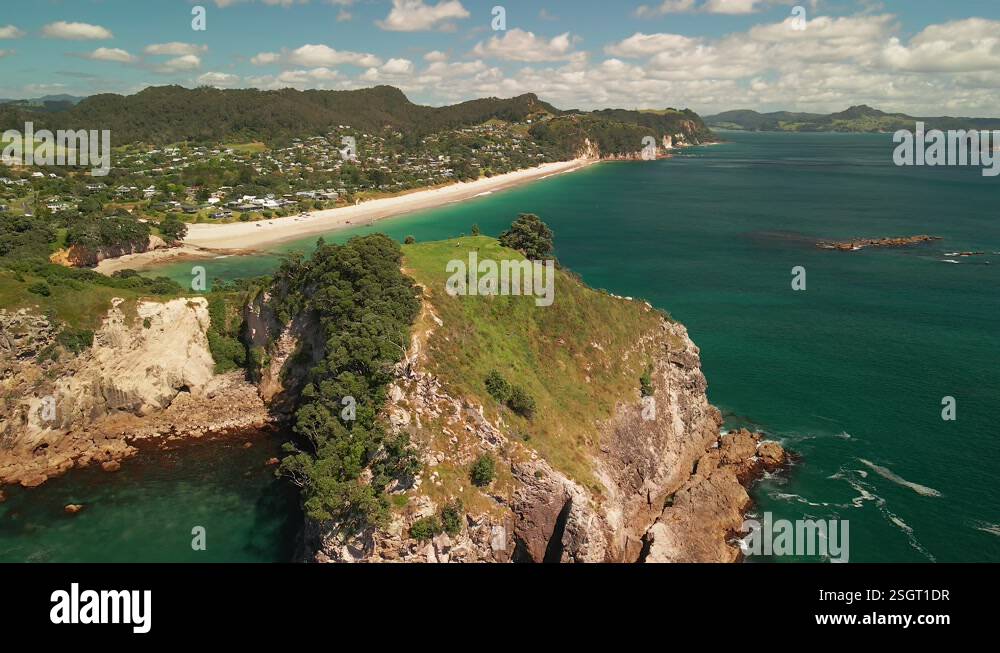 Flying over Te Pare point lookout at high tide Stock Video Footage - Alamy