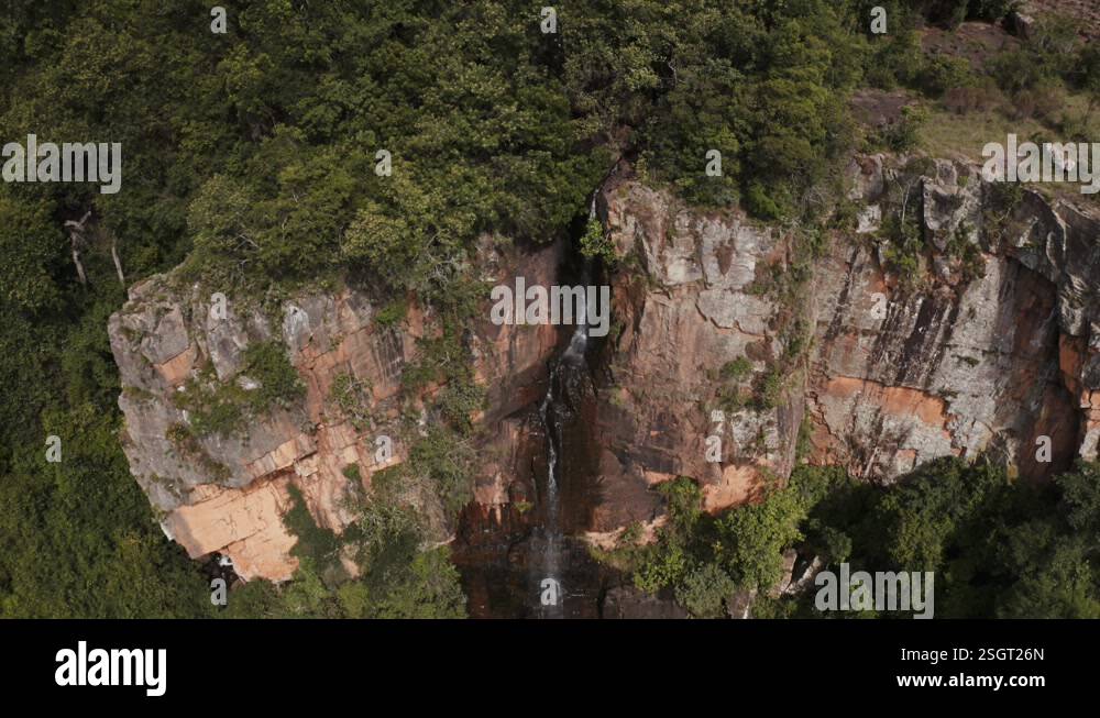 Aerial Waterfall Tracking Back to Reveal Forest and Pool of Water 4K ...