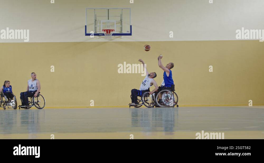 Wheelchair Basketball Game: Players Compete, Dribbling Ball, Passing ...