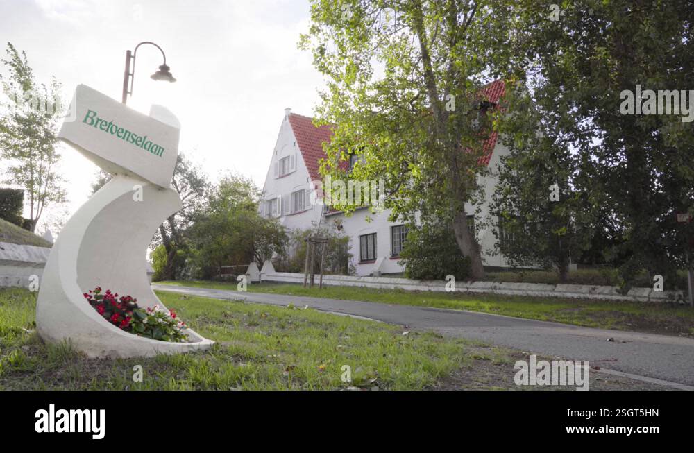 Typical city street view in the famous Concession quarter in De Haan ...