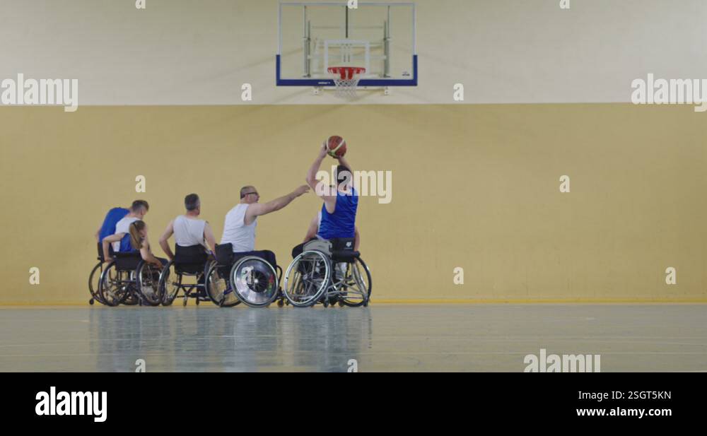 Wheelchair Basketball Game: Players Compete, Dribbling Ball, Passing ...