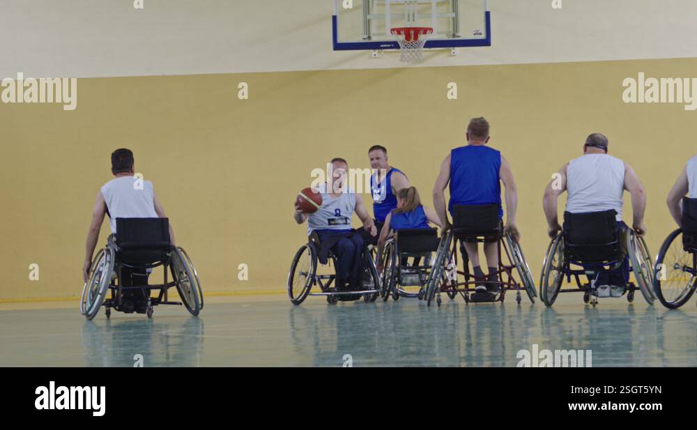 Wheelchair Basketball Game: Players Compete, Dribbling Ball, Passing ...