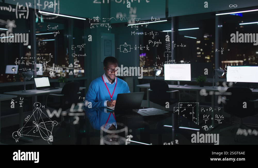 Scientist work on computer in modern office at night with holographic ...