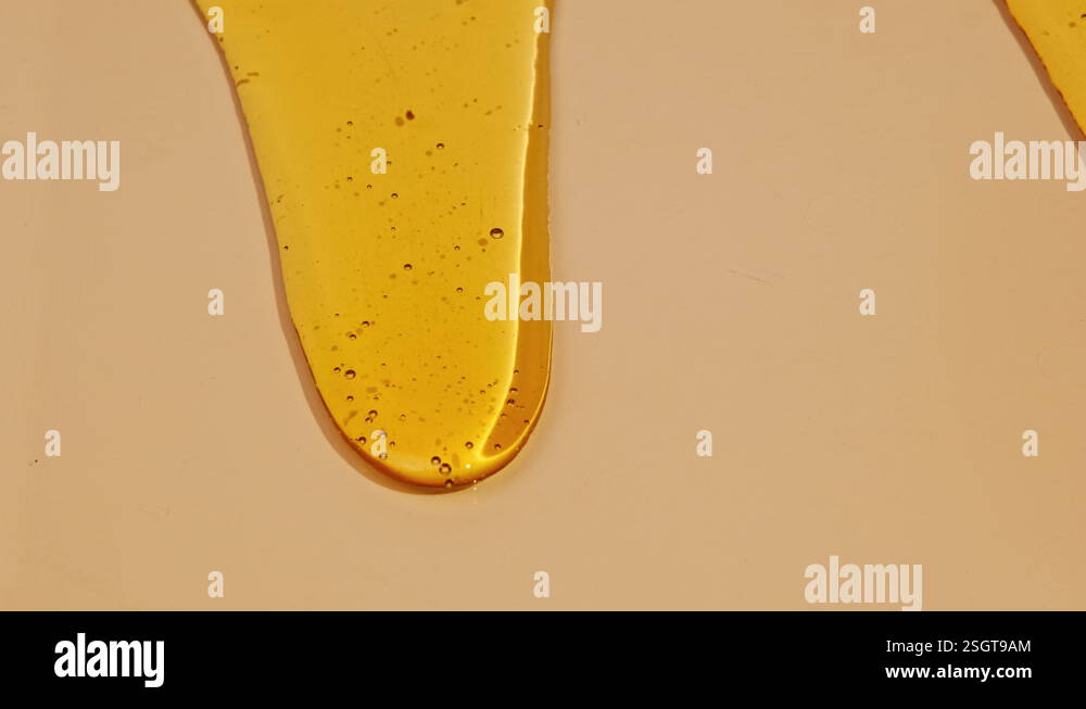 Sweet honey flowing on white background. Honey liquid texture. Healthy ...