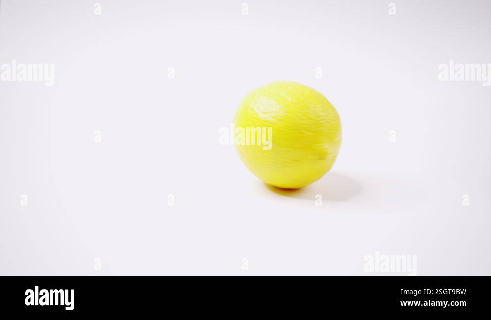 A lemon that gets spun around by hand, keeps spinning - natural fruits ...