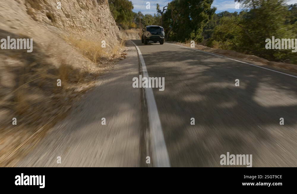 speed drone shot of Military grade truck, grey Rezvani Tank rear ...