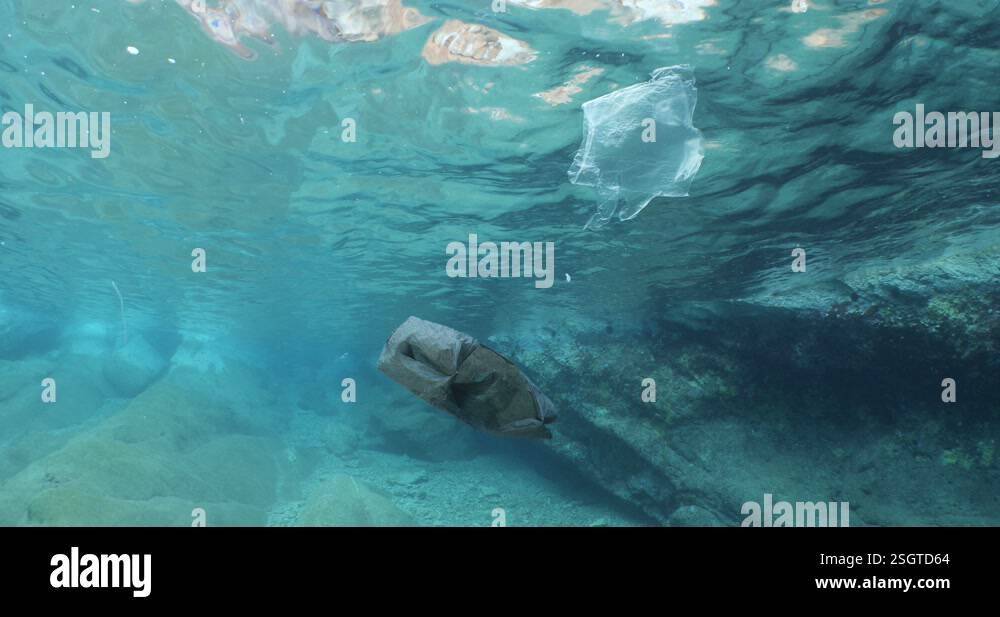plastic bag underwater bad for fish with sun rays background ocean ...