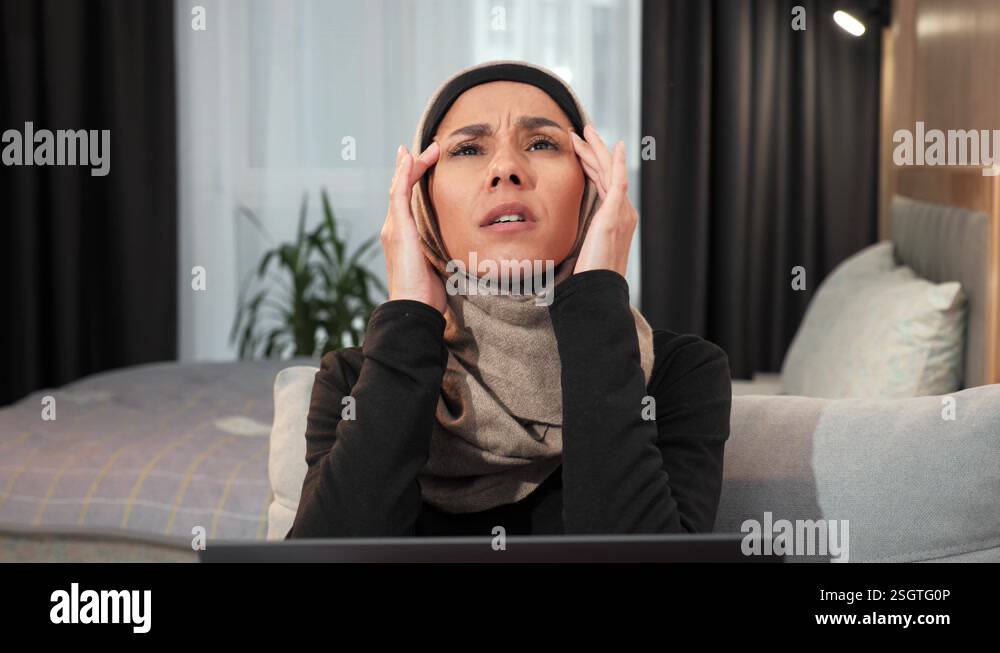 Tired Arabian Muslim Islamic woman in hijab female worker feeling bad ...