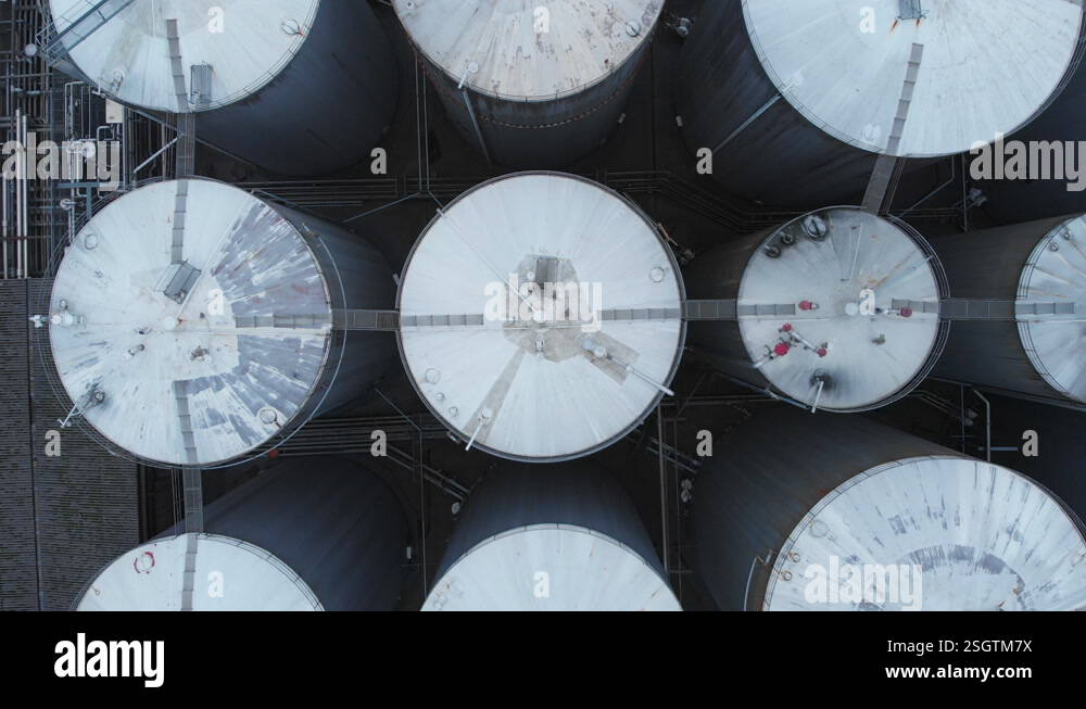 Fossil fuel storage tanks from above in climb 30fps 4k Stock Video ...