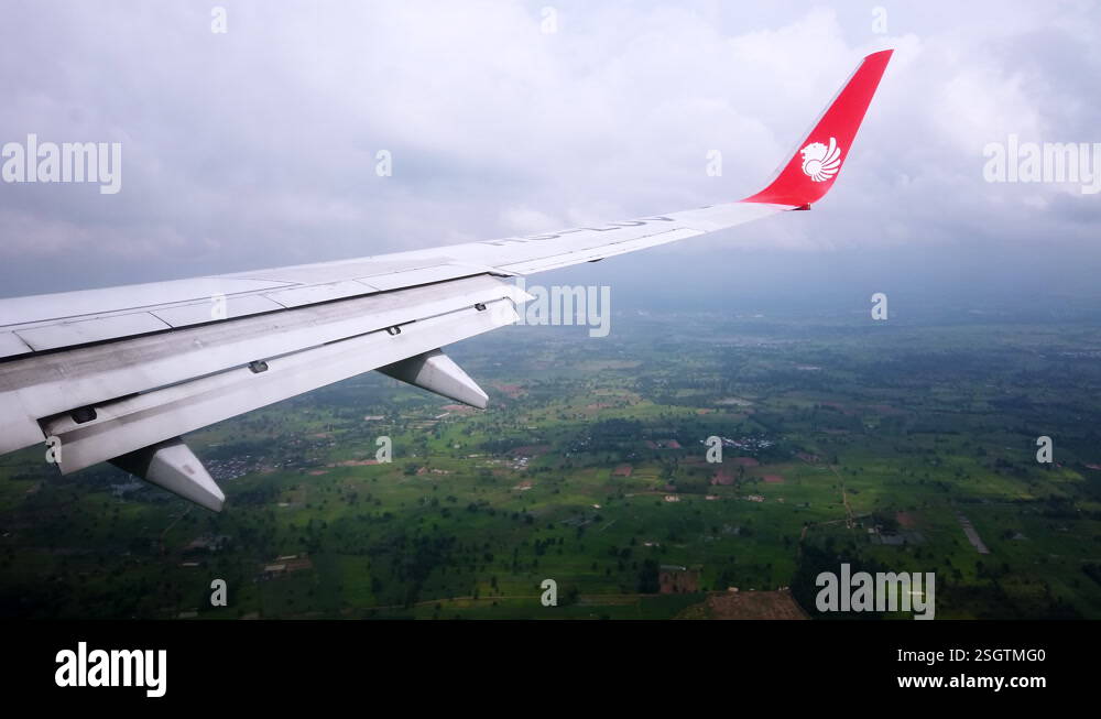 View the atmosphere window wing of a Thai Lion Air airplane flight in ...