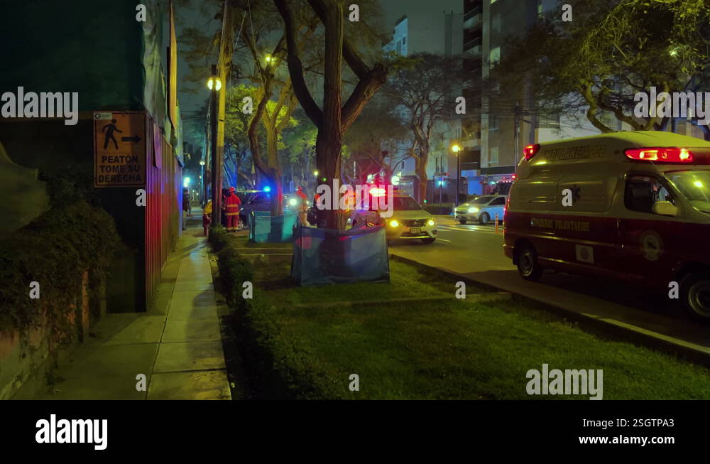 Static shot of police cars and ambulance on the scene after a car crash ...