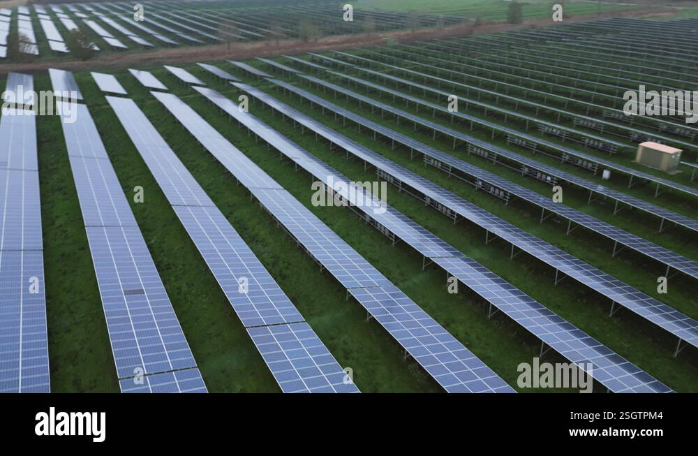 Solar panels in a solar park, pan-down Stock Video Footage - Alamy