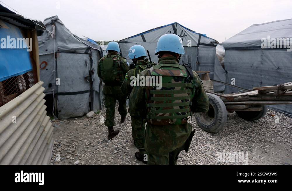 United Nations Brazilian soldier unit on a patrol in refugee camp Stock ...