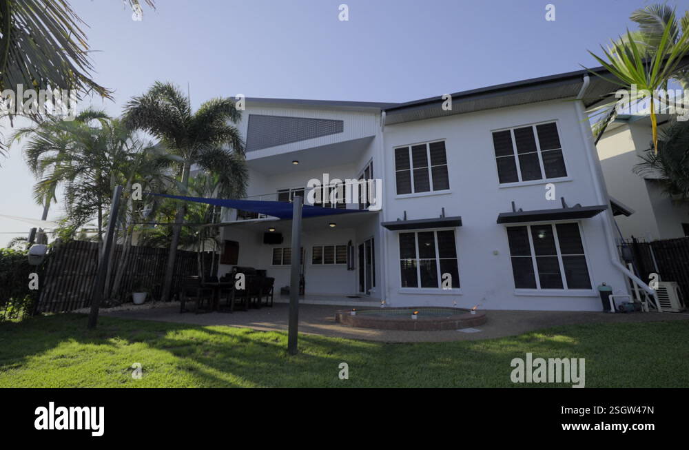 Ground level contemporary modern home large white windows. Tall house ...