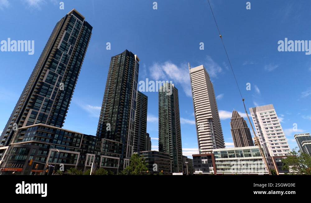 Large new modern residential towers of various types in summer, pan ...