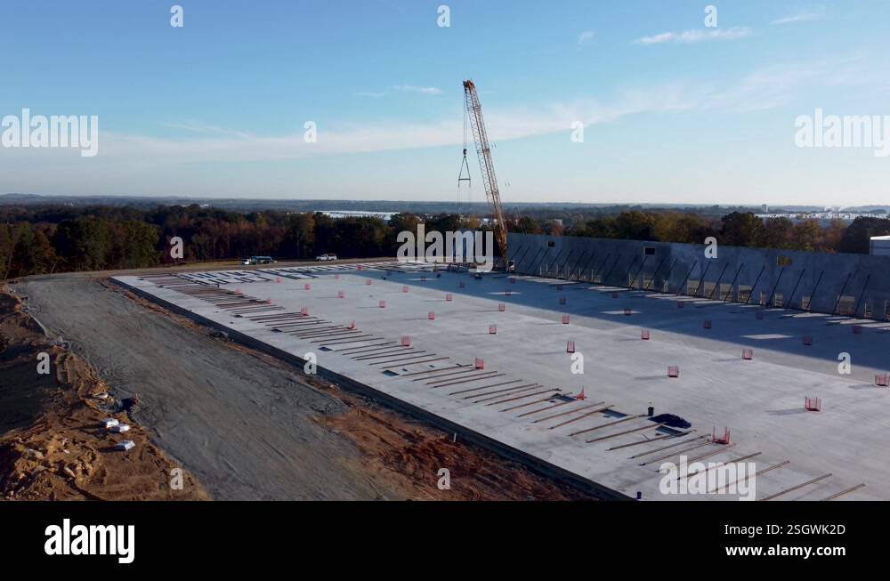 an ascending drone shot showing off the full process of lifting a ...