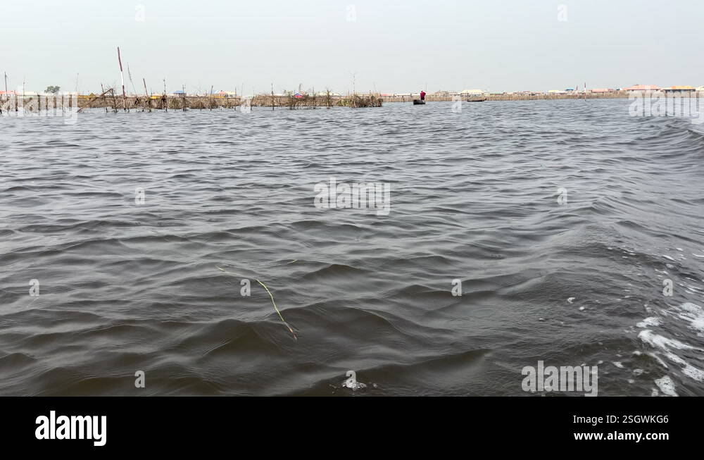Boating on African Lake Nokoue, View of Wake from Boat Stock Video ...