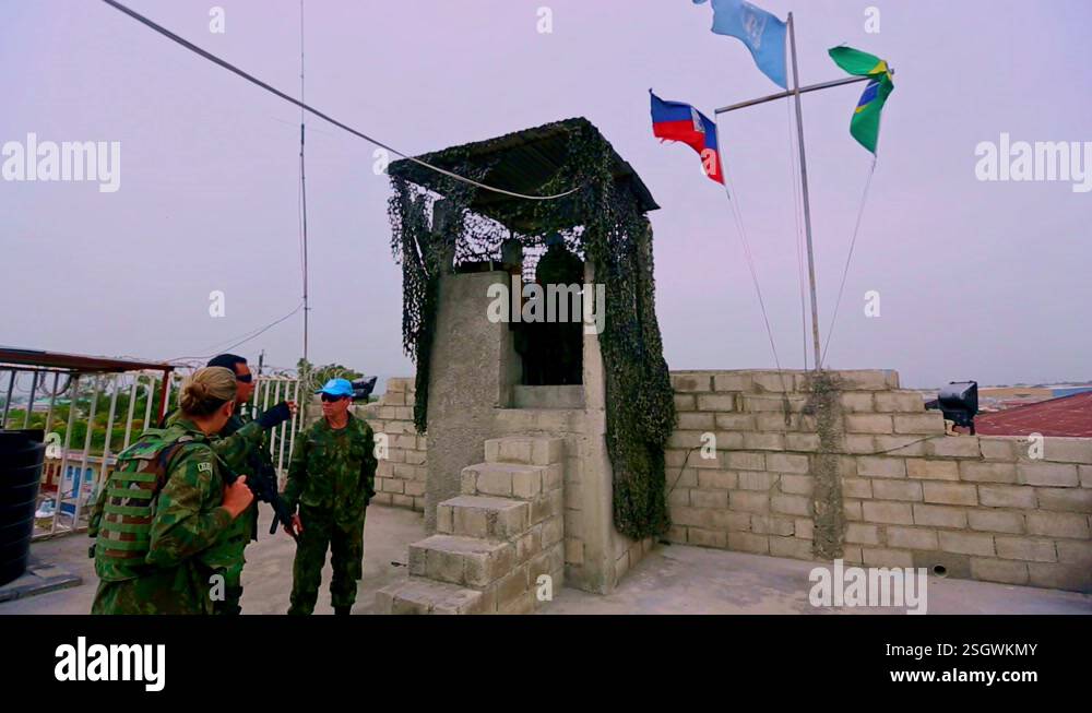 United nations soldiers in a guard tower protecting people in Haiti ...