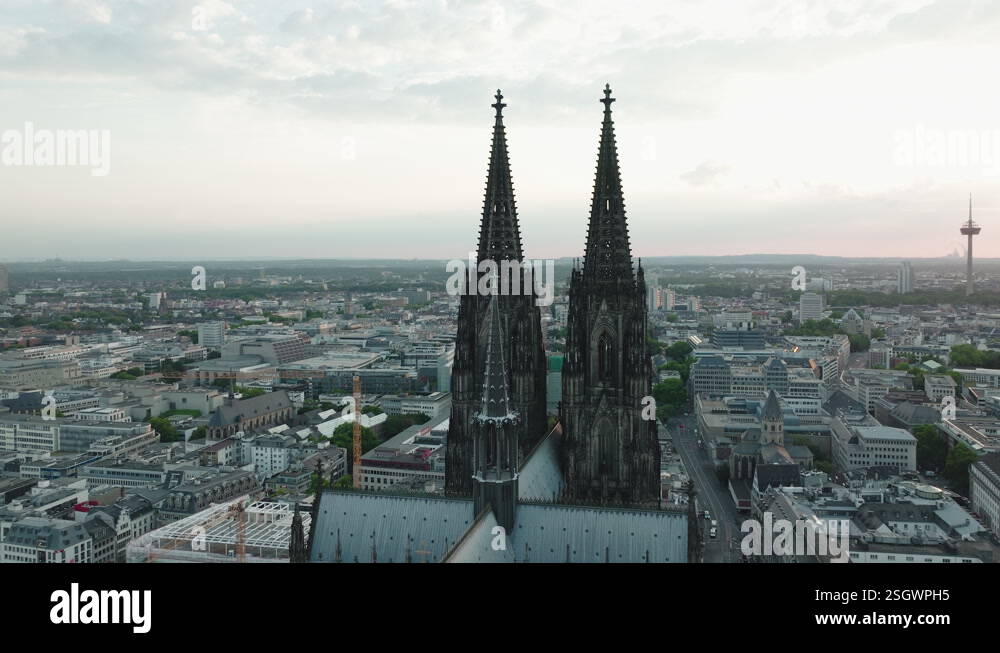 The Cologne Cathedral is filmed by a drone, the drone flies towards the ...