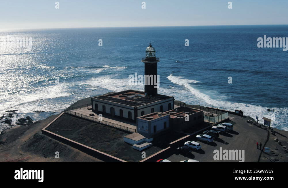 Fantastic aerial shot in fast orbit and close to the Jandia lighthouse ...