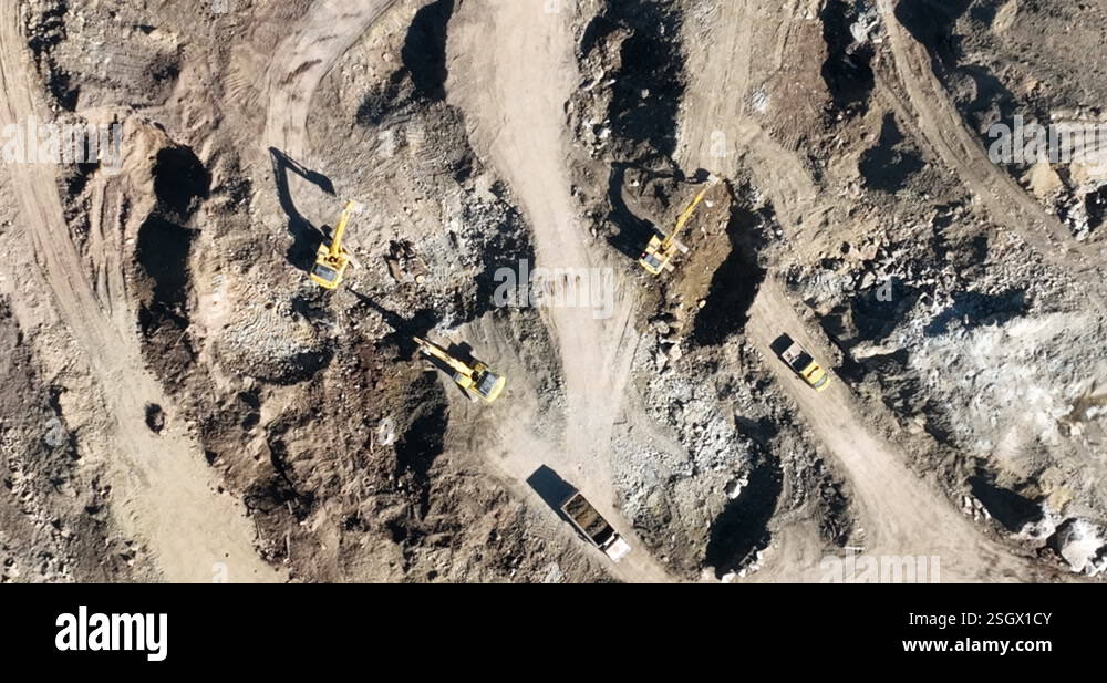 Industrial mine excavators are digging the soil in the construction ...