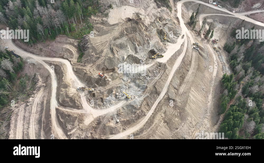 Industrial mine excavators are digging the soil in the construction ...