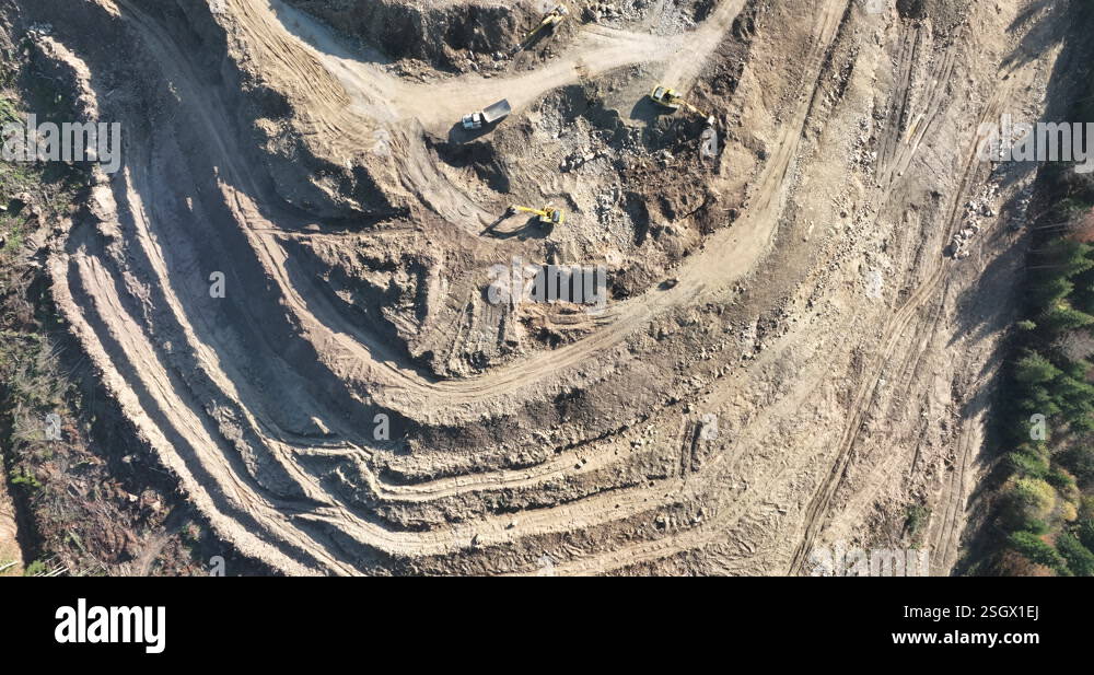 Industrial mine excavators are digging the soil in the construction ...