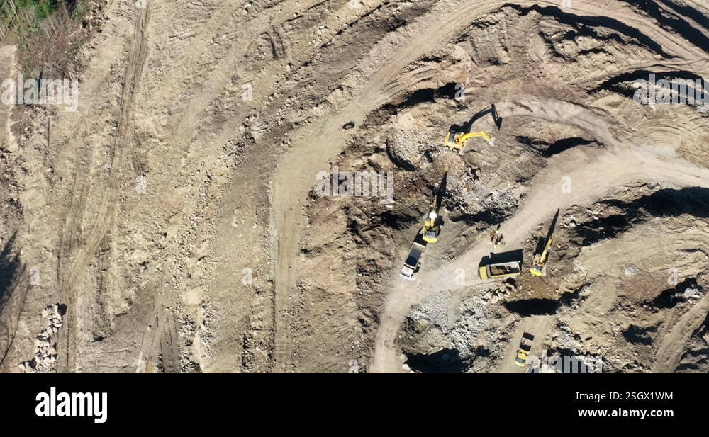 Industrial mine excavators are digging the soil in the construction ...